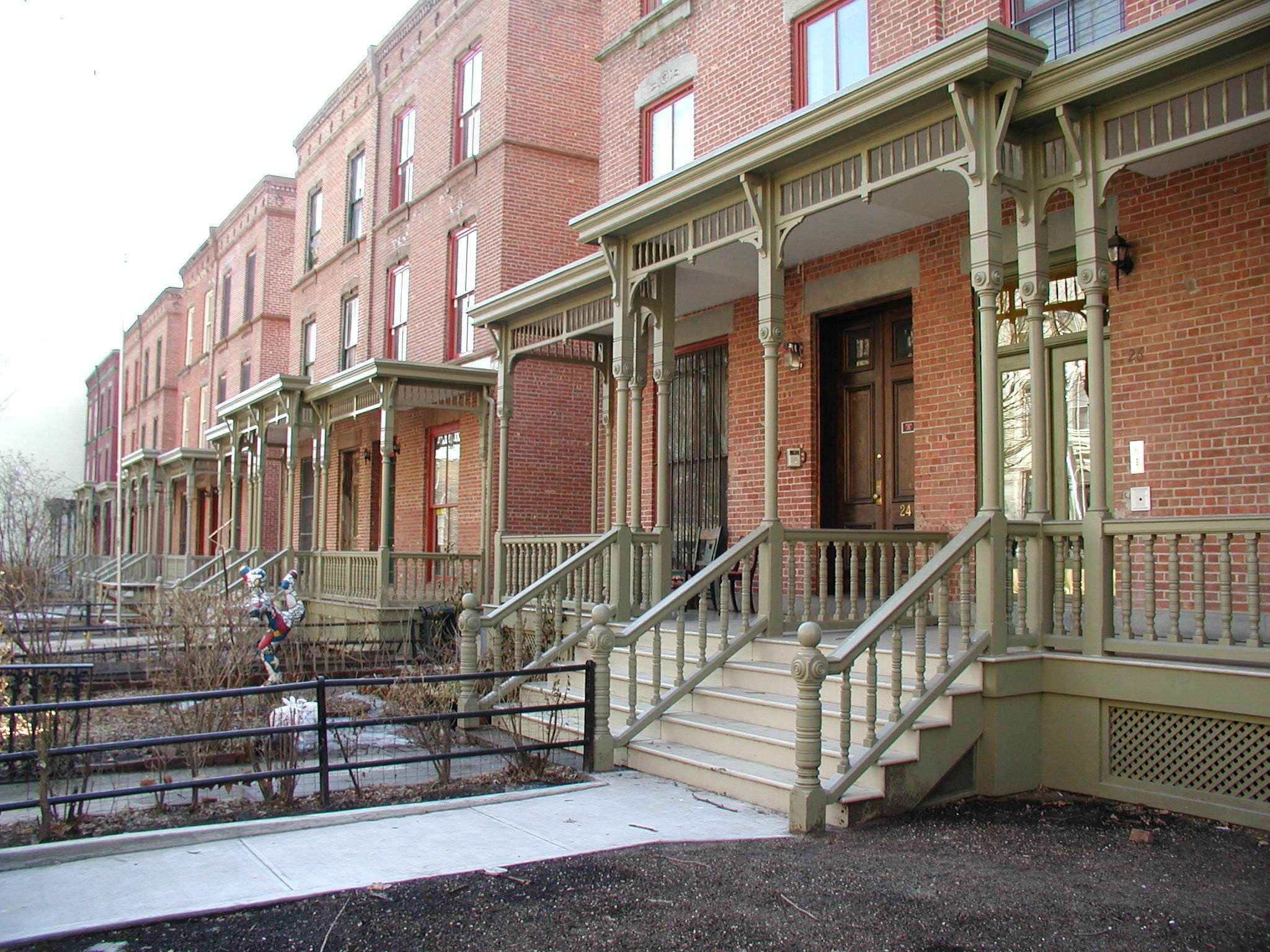 A Harlem street with a "quiet Southern town" vibe shines again